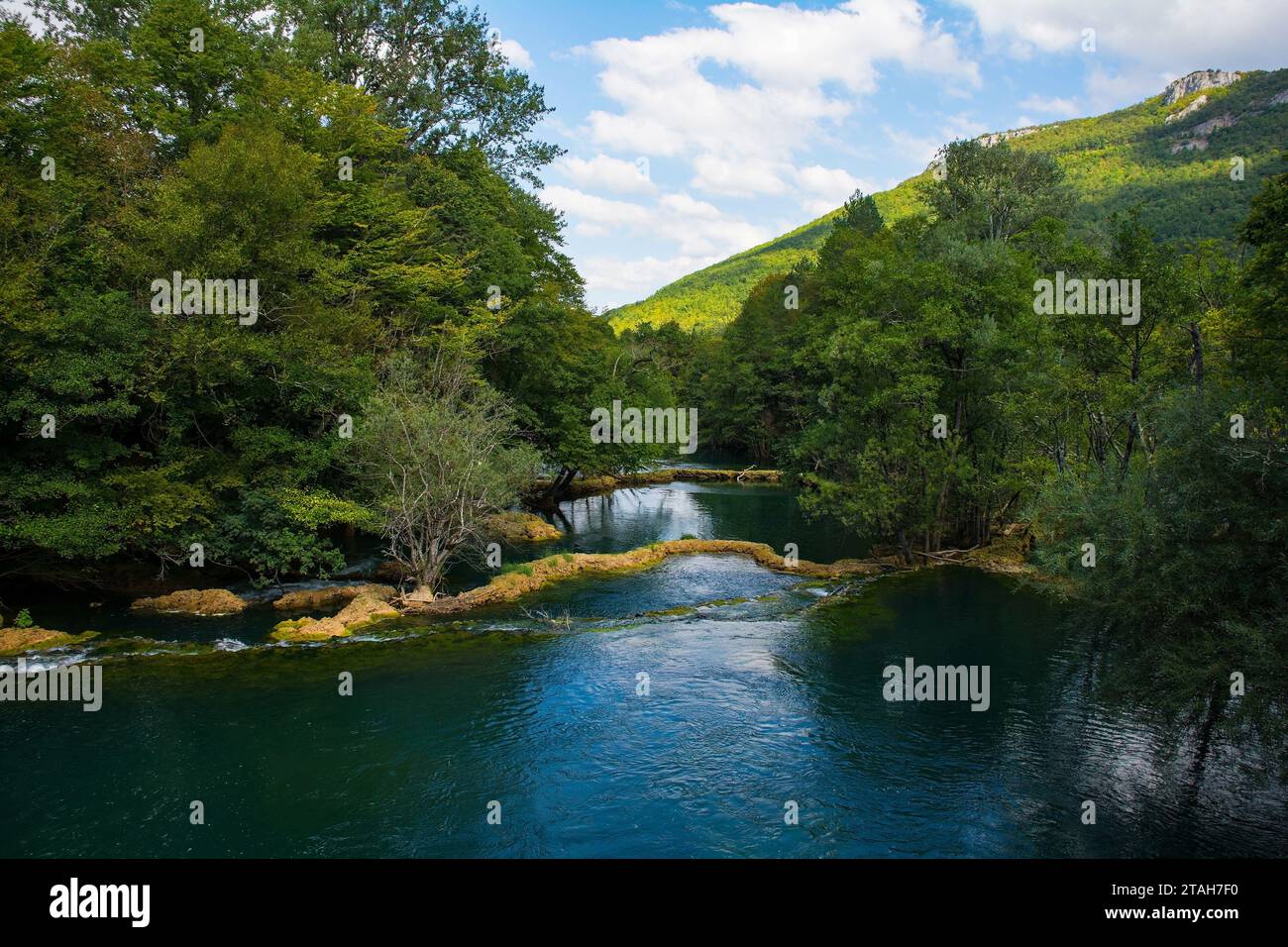Travertine pools in the River Una as it flows from the Small Waterfalls ...