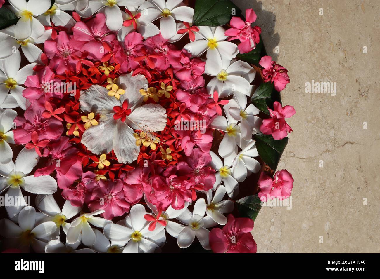 Beautiful Floating flower decorations done in large clay flat pot ...