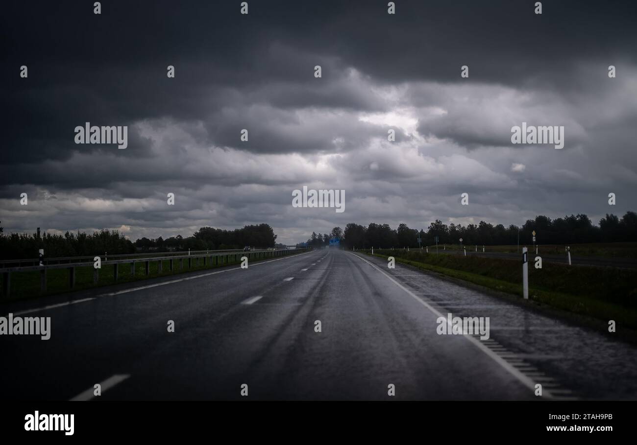 Bad road conditions. Rain and worsening weather Stock Photo - Alamy