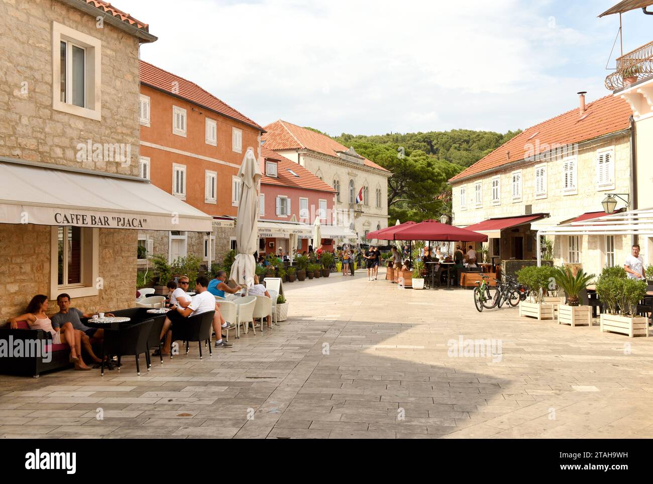 Jelsa, Croatia - August 2018: People relax in cafe of town Jelsa on ...