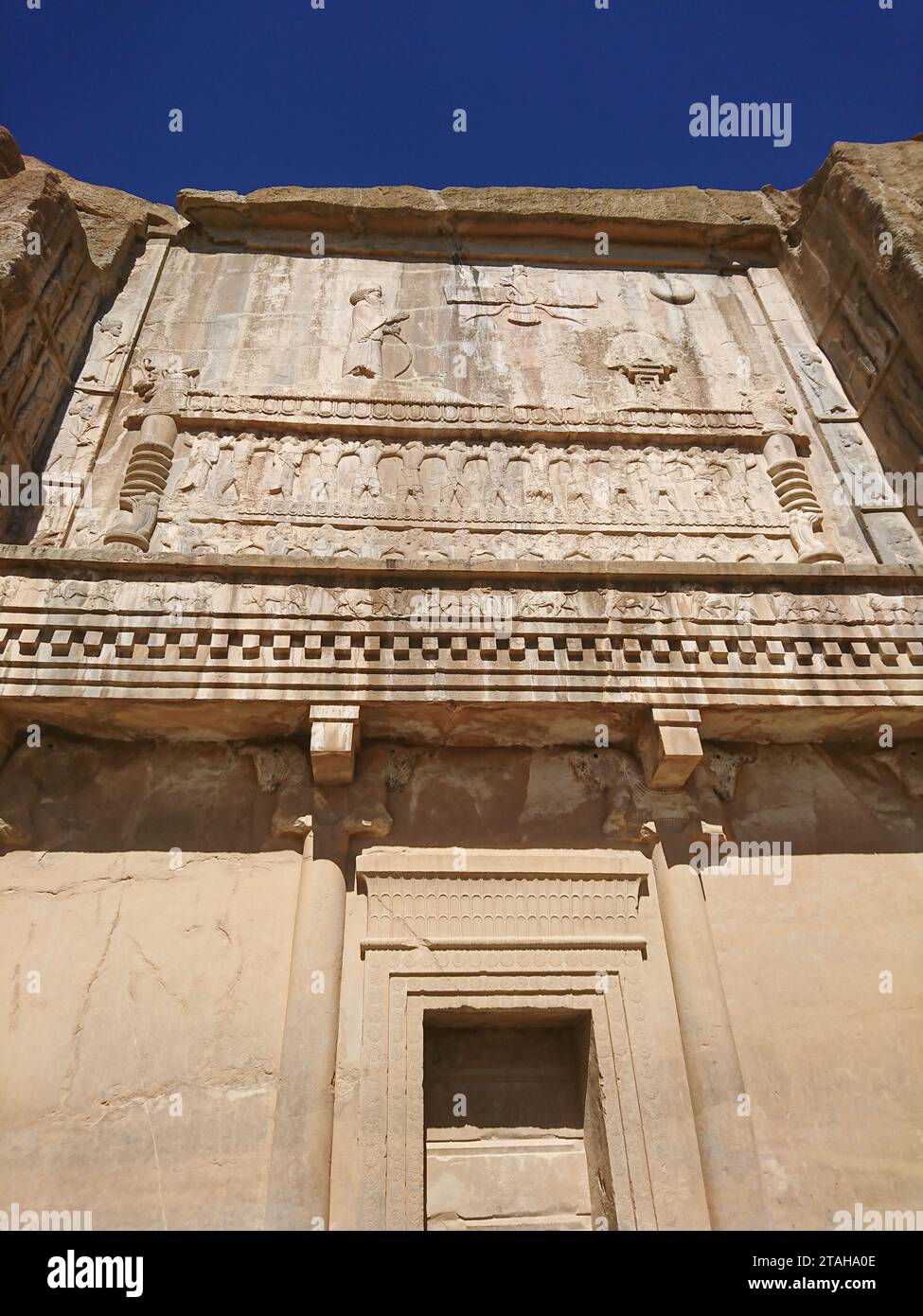 Hieroglyphs carved on the wall of an ancient temple. Remains of ...