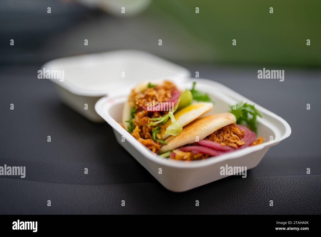 Bao kebab in the car. Fast food Stock Photo - Alamy