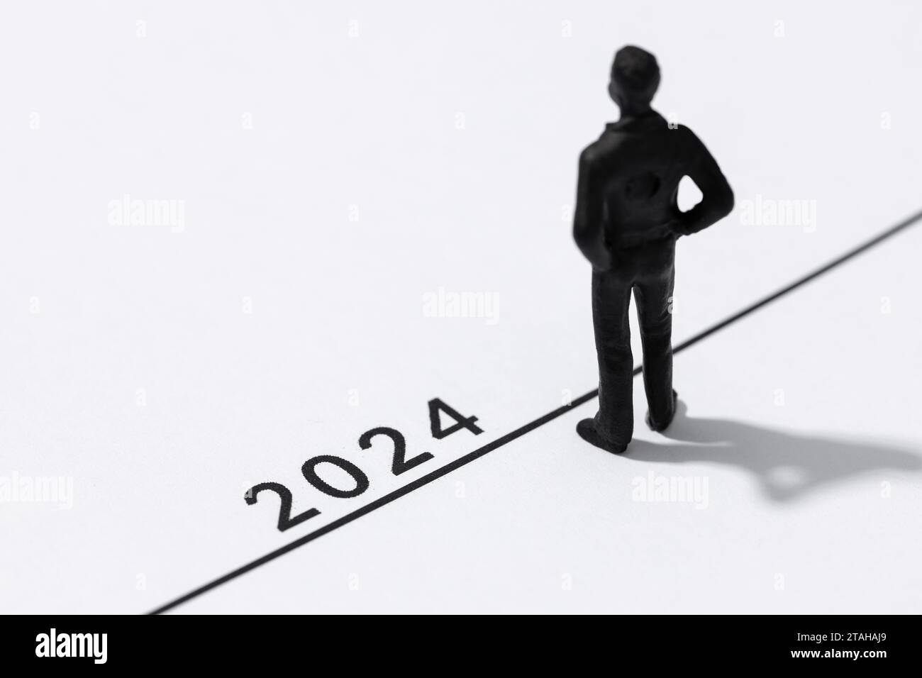 2024 year Business plan concept. Human Figurine on start line looking ...