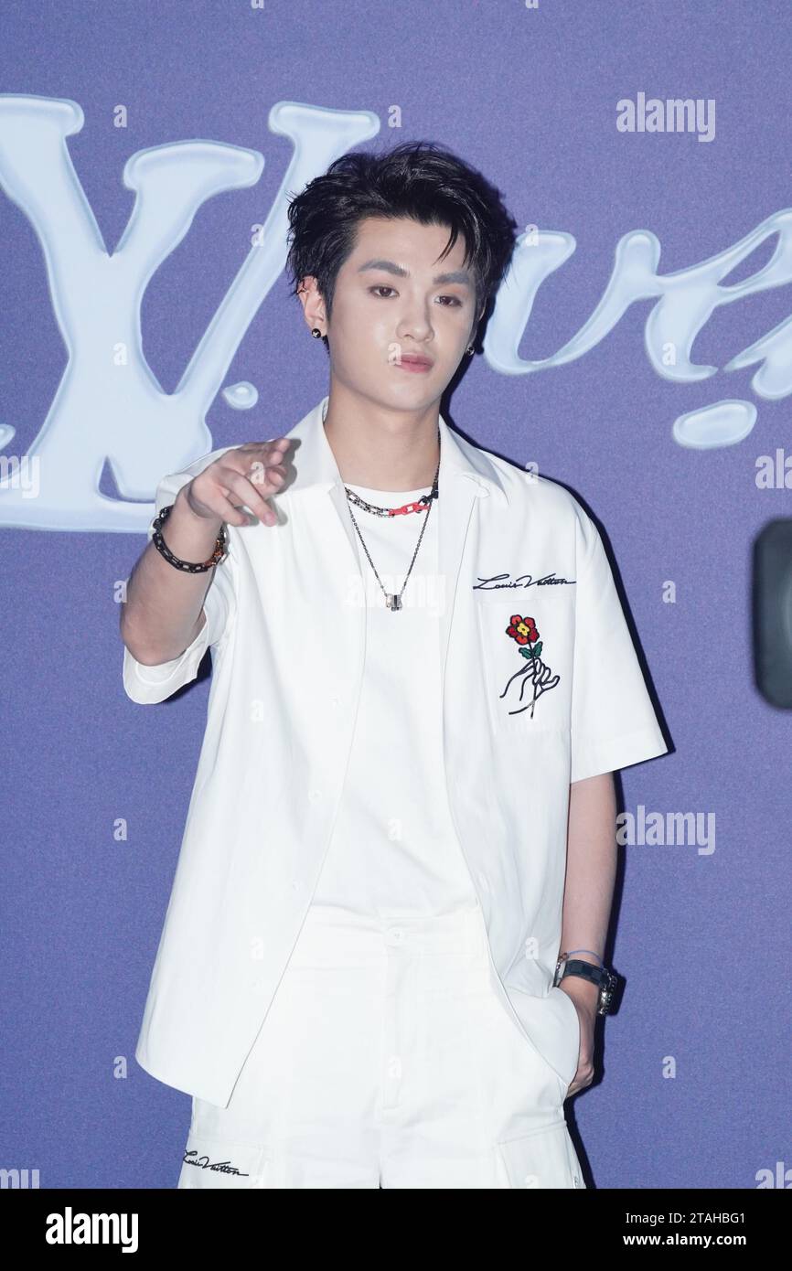 Chinese singer and actor Huang Minghao attends the Louis Vuitton ...