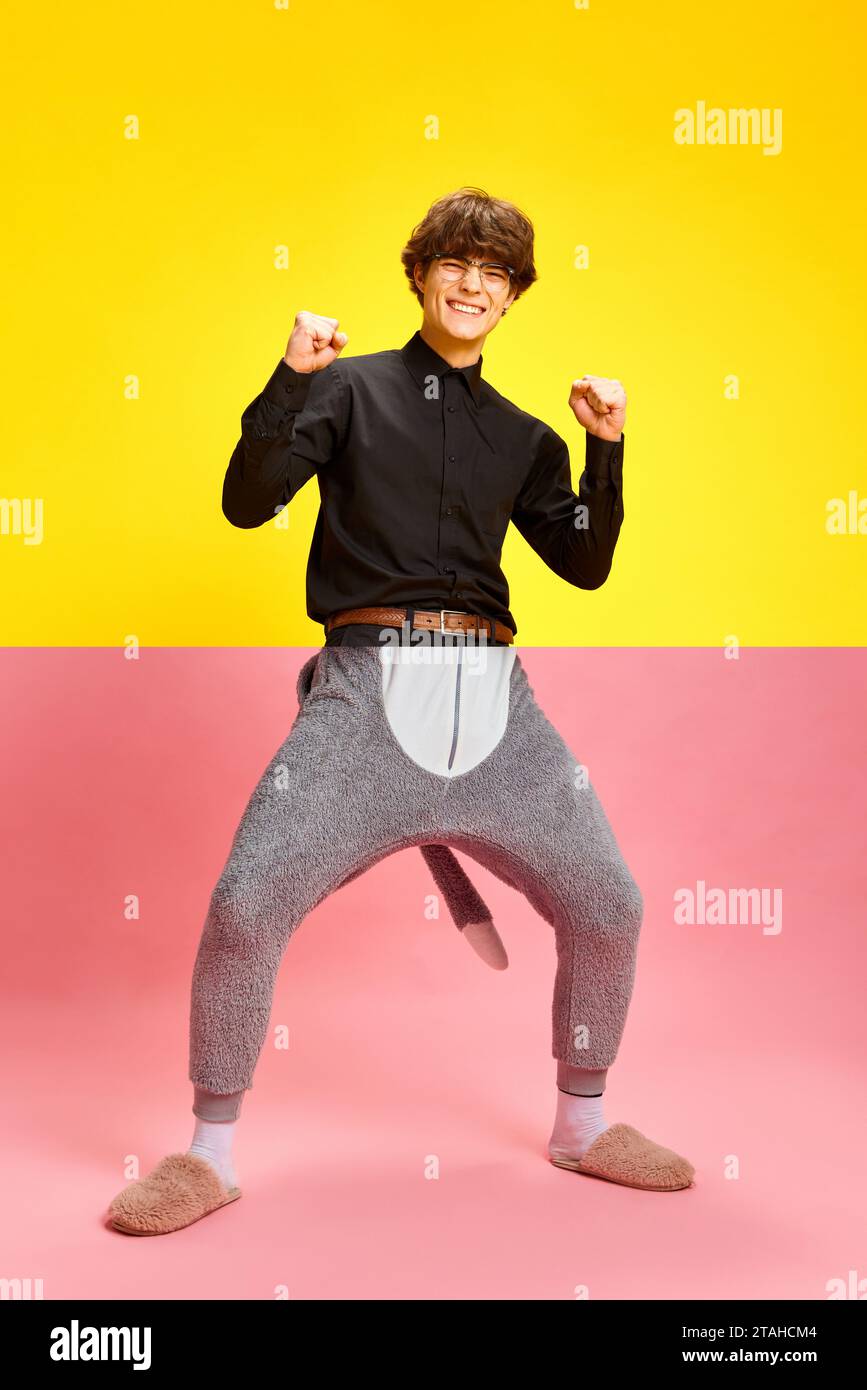 Creative collage of two halves of emotional young man in various ...