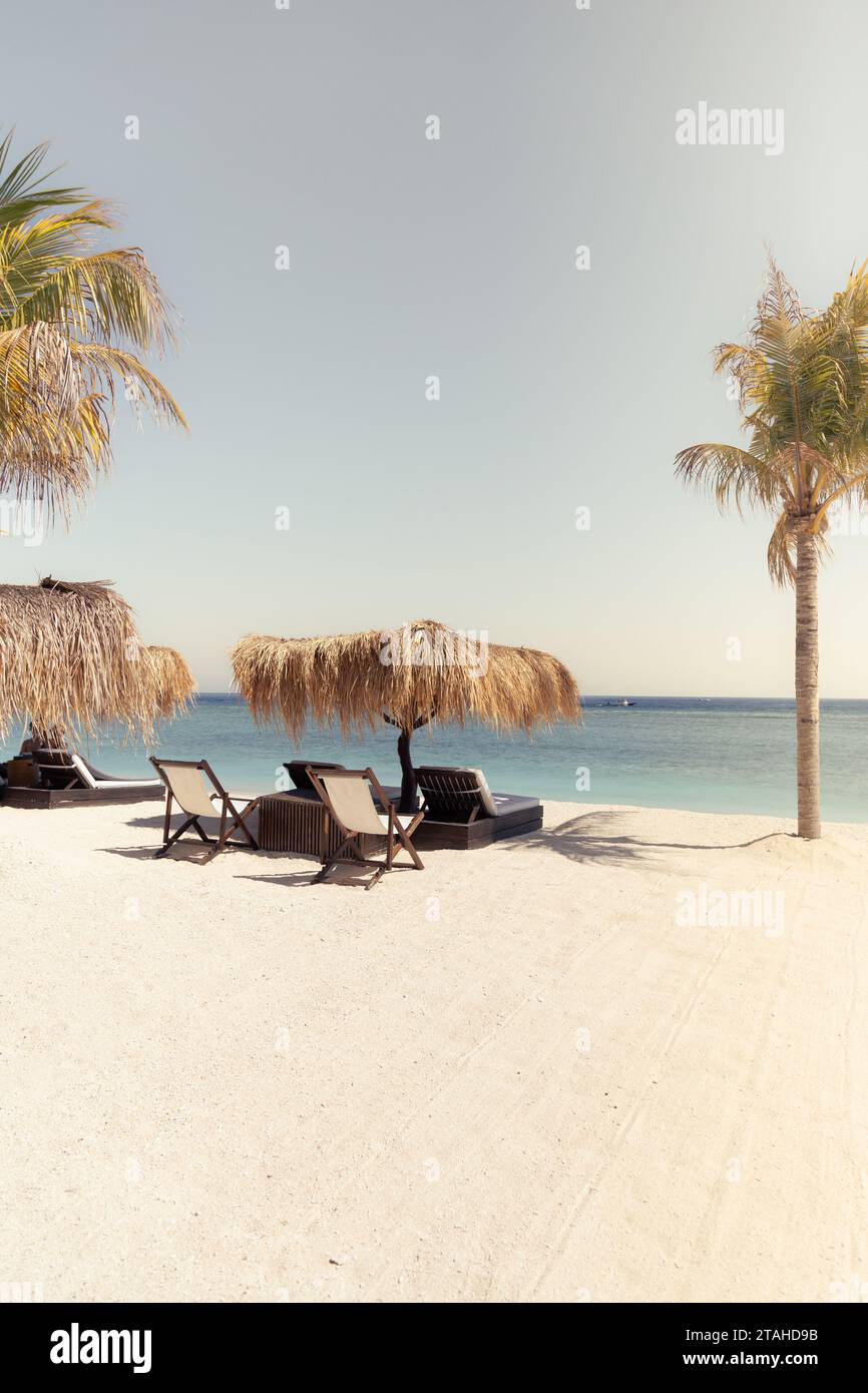 Empty beach hut with chairs at sandy beach of Gili Islands Stock Photo ...