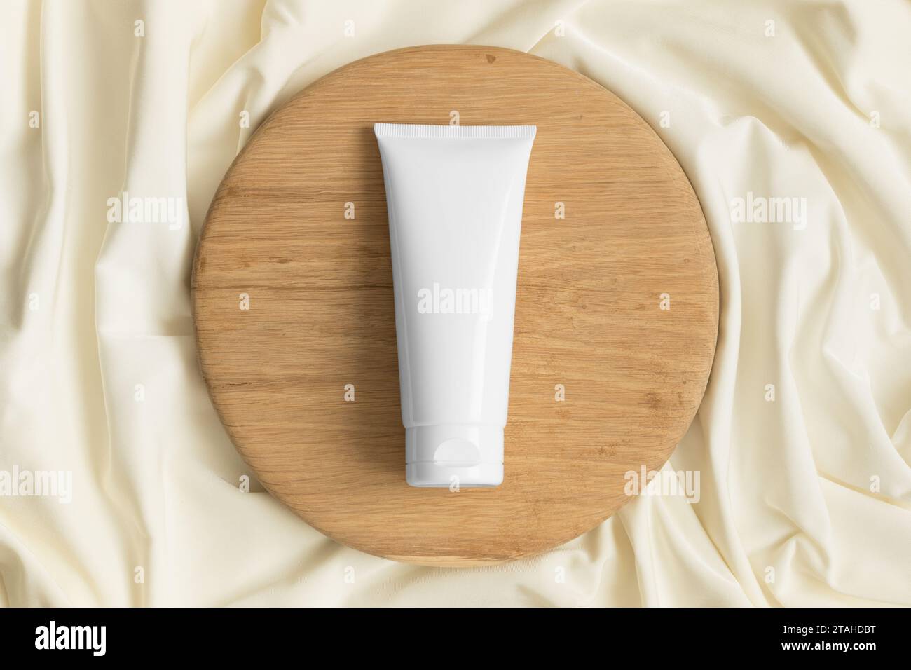White tube of cream mockup on the yellow textile Stock Photo - Alamy