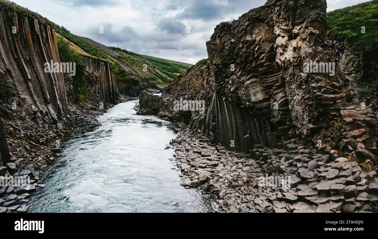 Glacial river going through basalt column gorge landscape Stock Photo ...