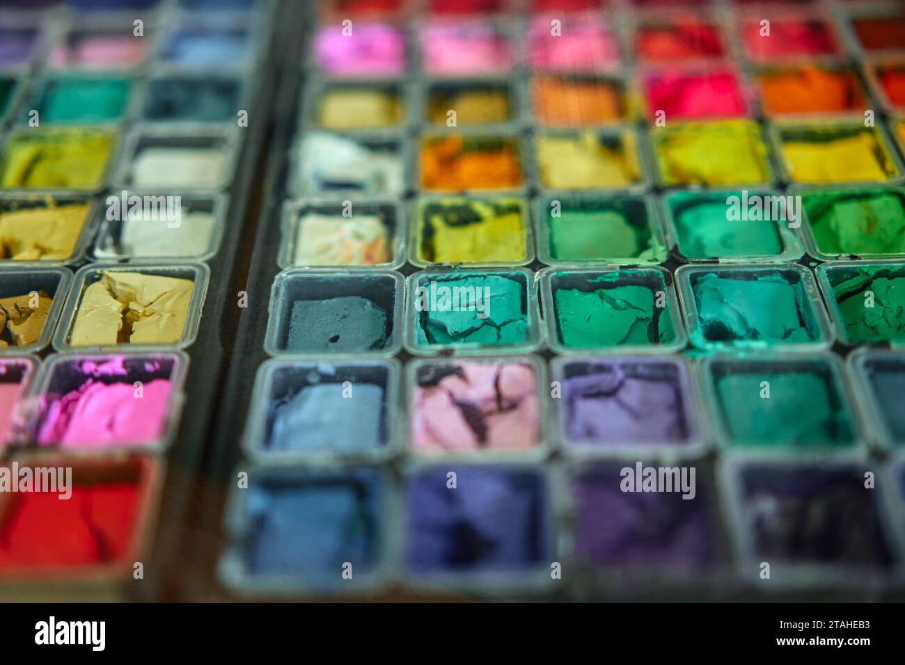 Dry color in the color tray Stock Photo - Alamy