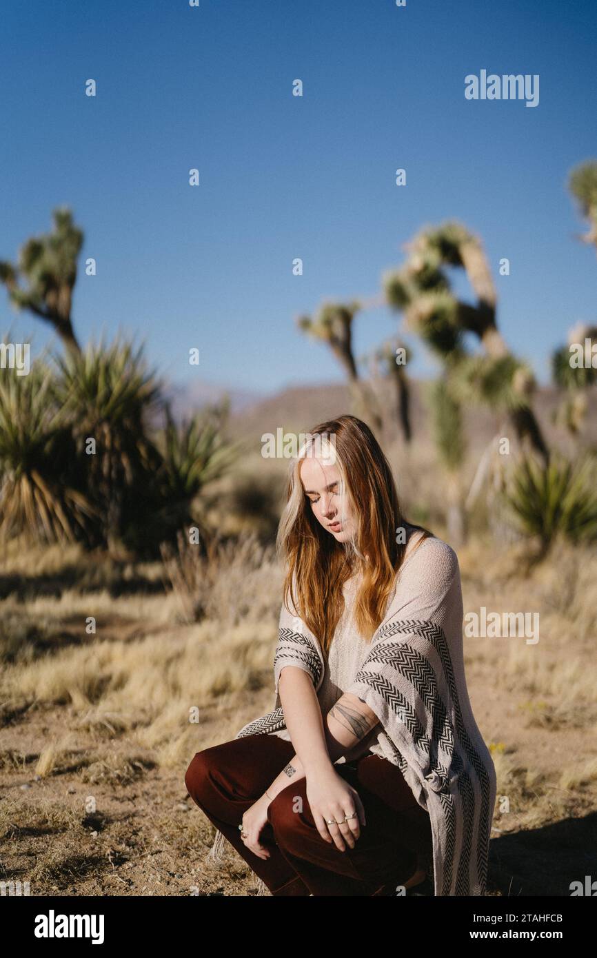 Pants kneeling looking hi-res stock photography and images - Alamy