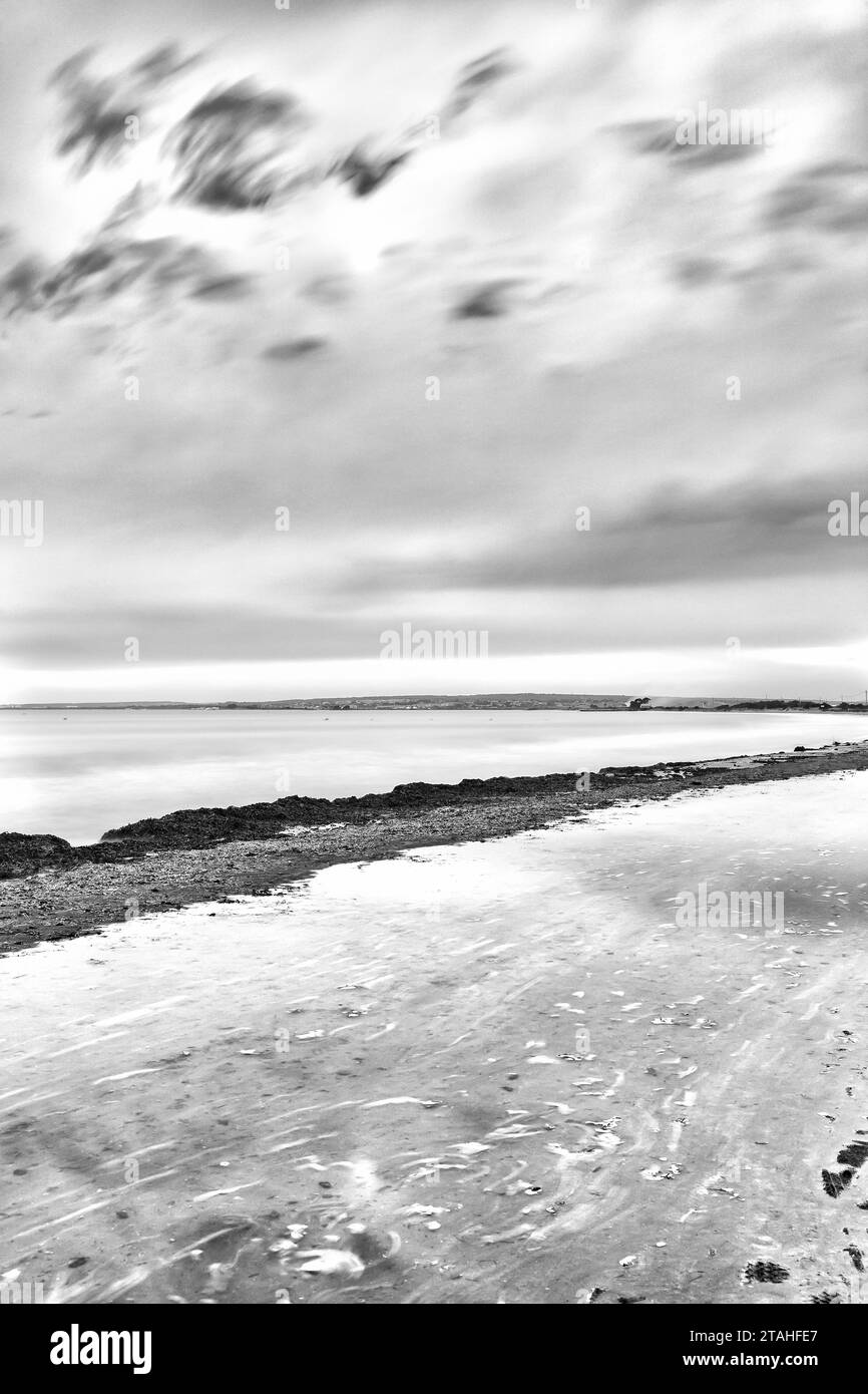 Puddle on the beach of Santa Pola Stock Photo - Alamy