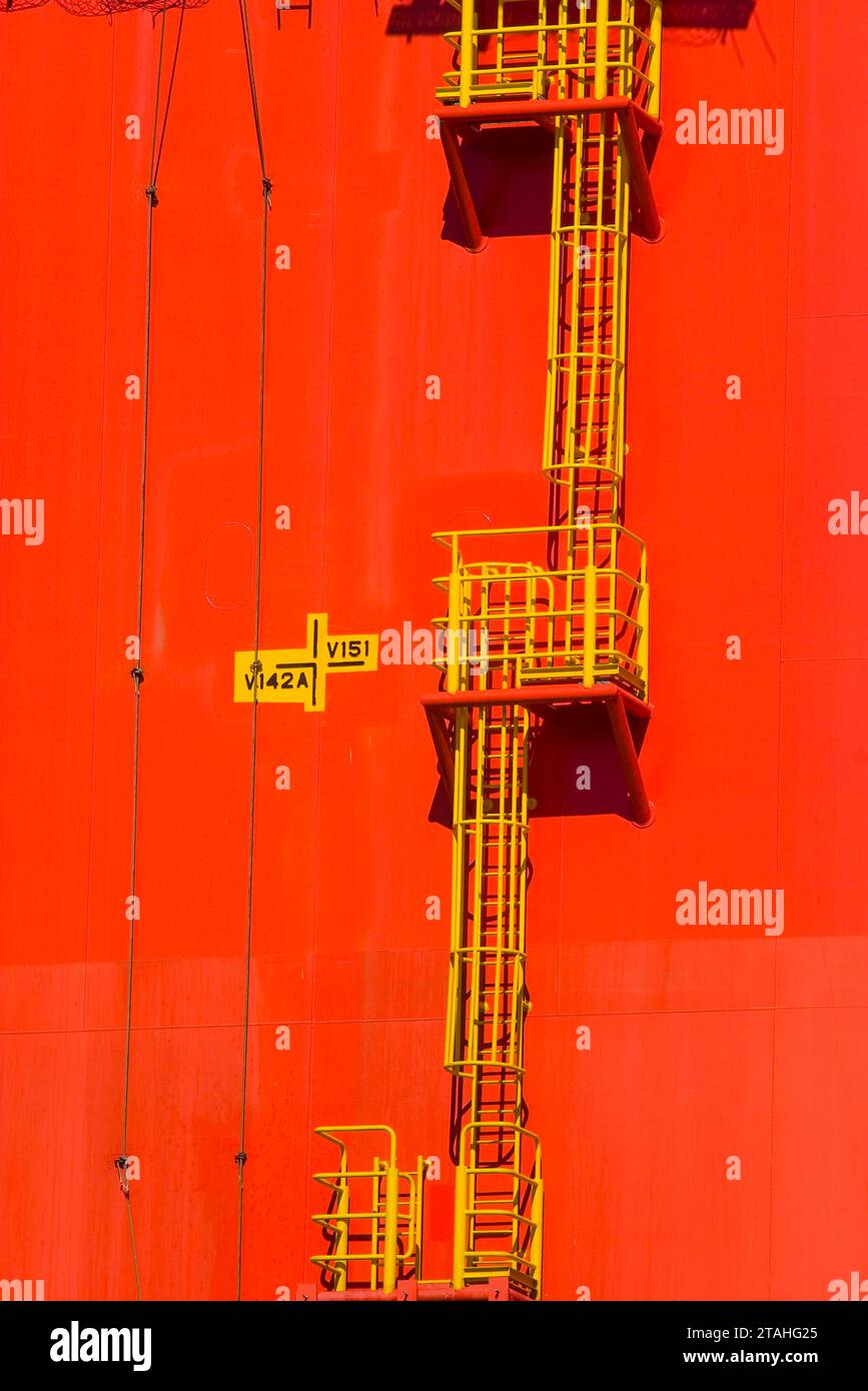 Ladder on hull of oil platform Stock Photo - Alamy