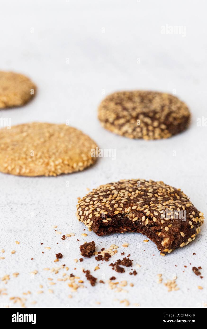 Sesame cookies with cookie crumbs Stock Photo - Alamy