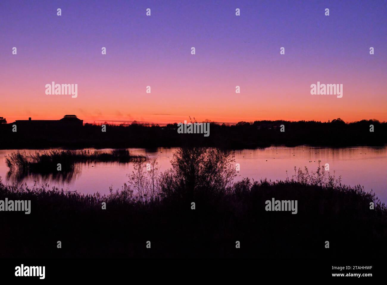 Sunset over over the former Lambeth Reservoir of Molesey Reservoirs ...