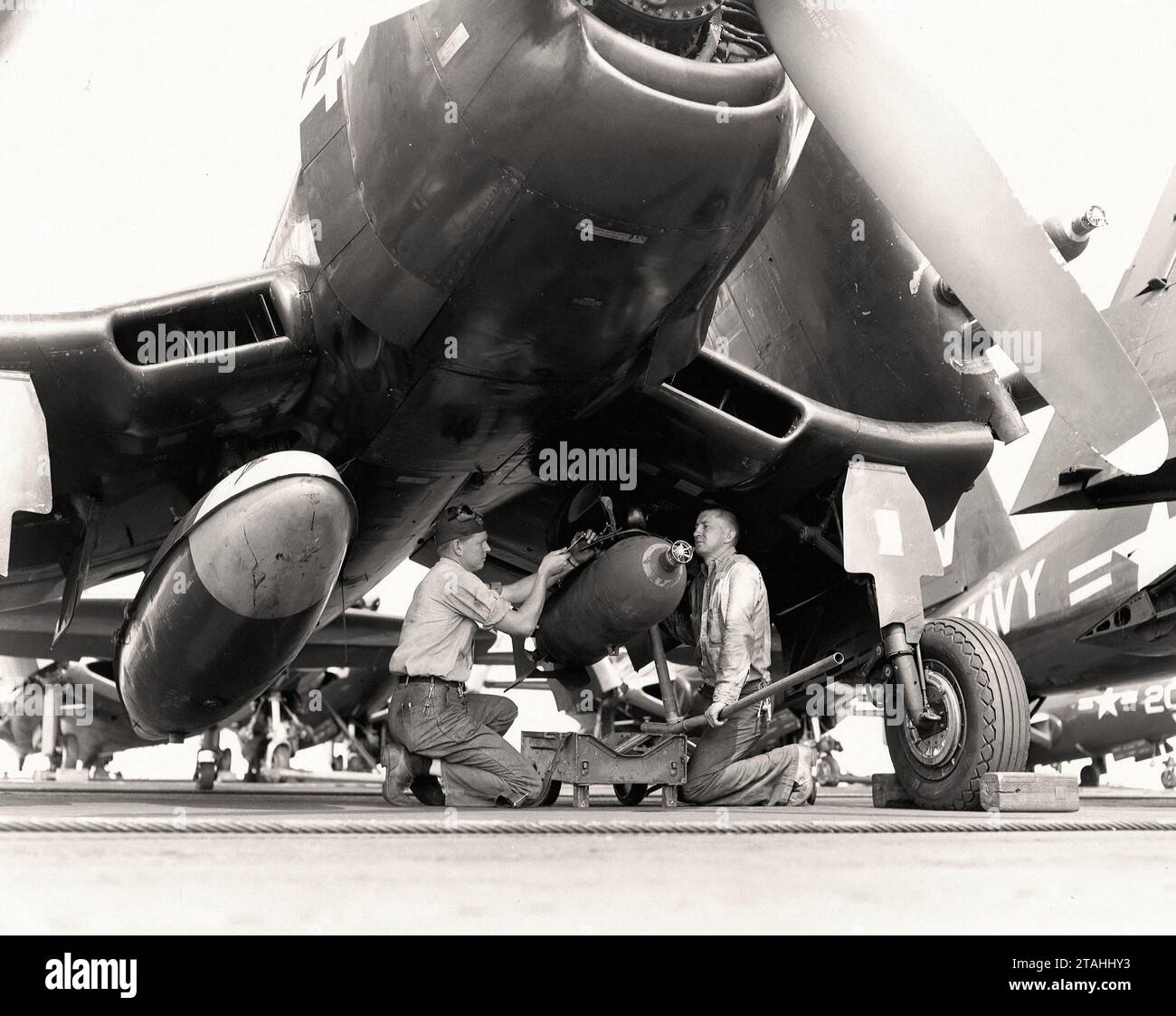 Airplane - Vought F4U-4. Loading Bomb Stock Photo - Alamy