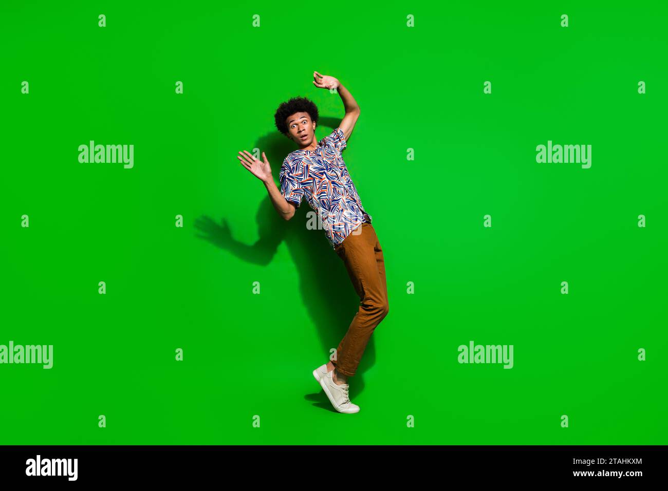 Full body size photo of scared guy raised hands up panic nervous ...