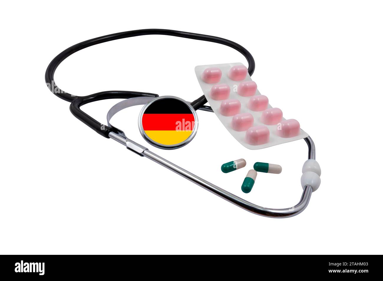 Medical stethoscope with a head in the shape of a German flag and pills ...