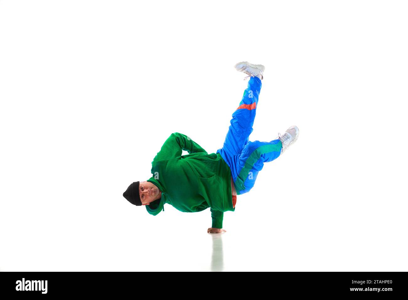 Fashionable portrait. Stylishly dressed man performing freestyle dance ...