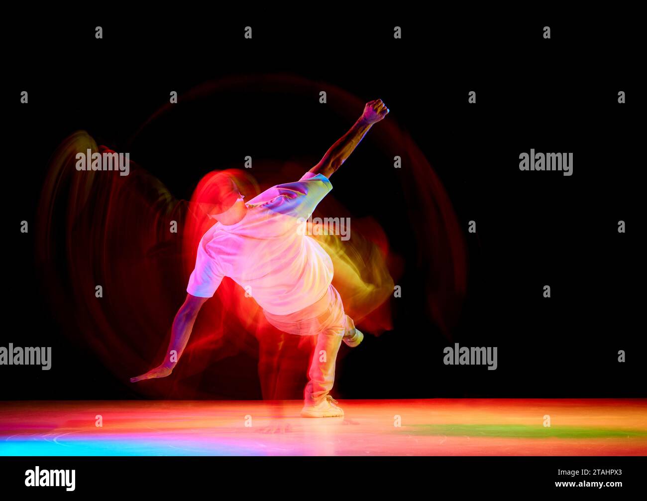 Dance show. Athletic guy dancing contemp, breakdance and hip-hop ...