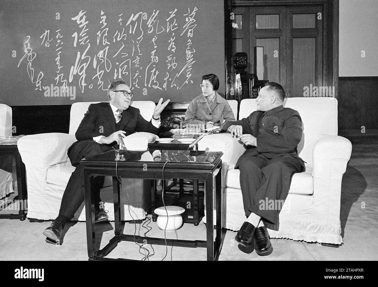 FILE - Then Chinese Premier Deng Xiaoping, right, listens as then U.S ...