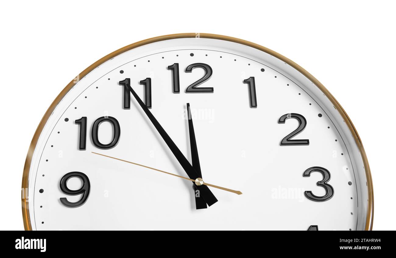 Clock showing five minutes until midnight on white background, closeup ...