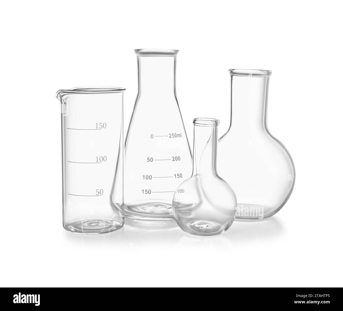 Many laboratory flasks and beaker isolated on white Stock Photo - Alamy