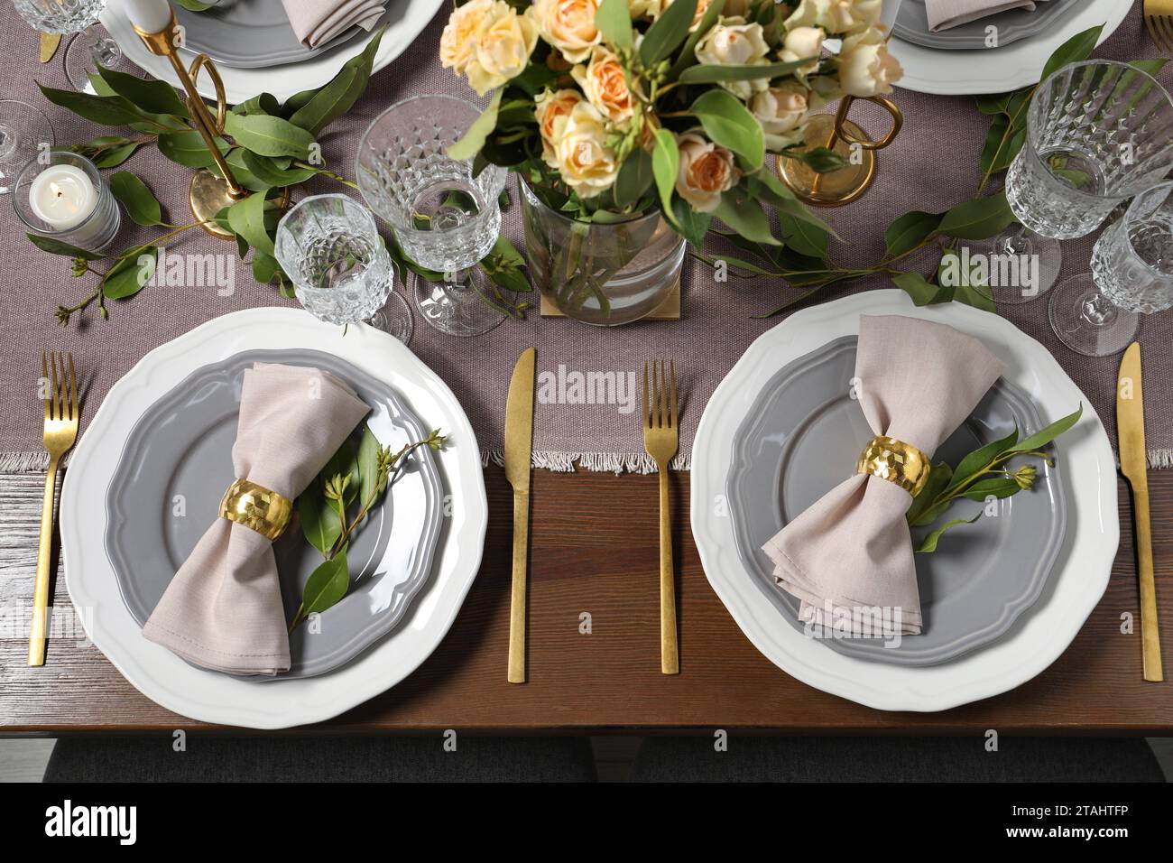 Beautiful table setting with floral decor, flat lay Stock Photo - Alamy
