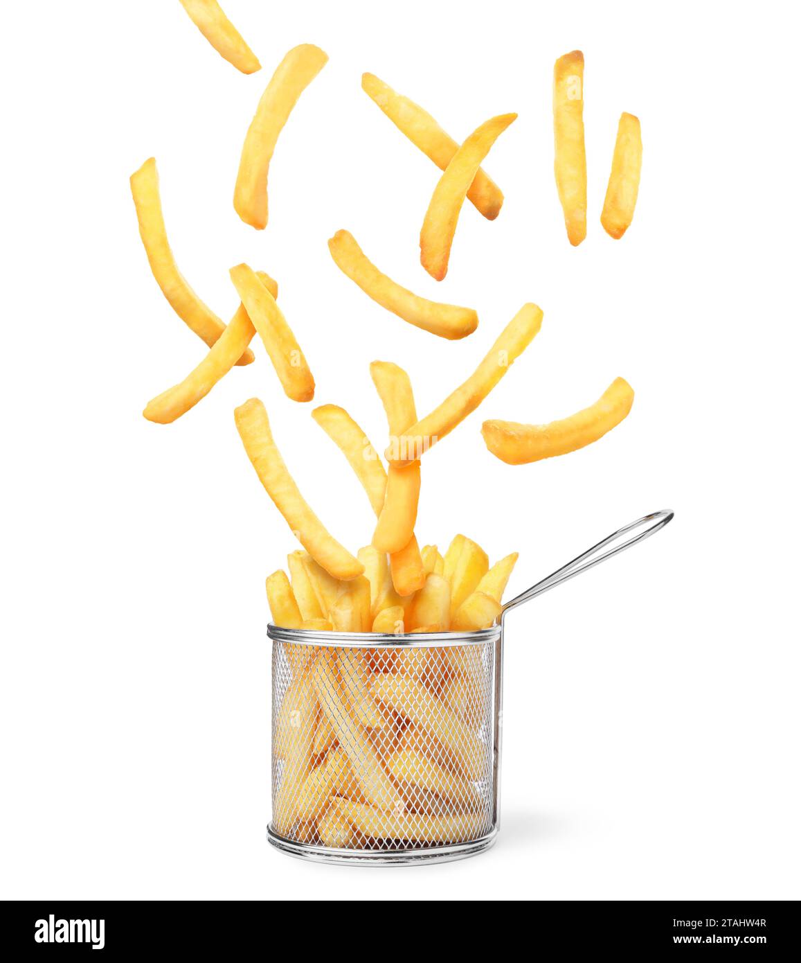 Tasty French fries falling into metal basket on white background Stock ...