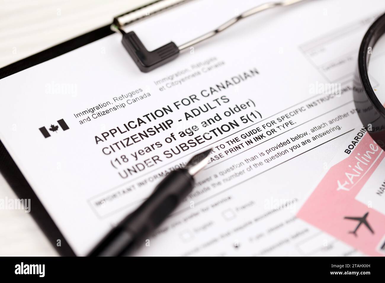 Application for Canadian citizenship for adults on A4 tablet lies on ...