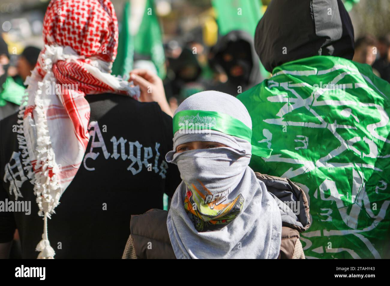 Hebron, West Bank. December 1, 2023. Palestinians raise flags of the ...