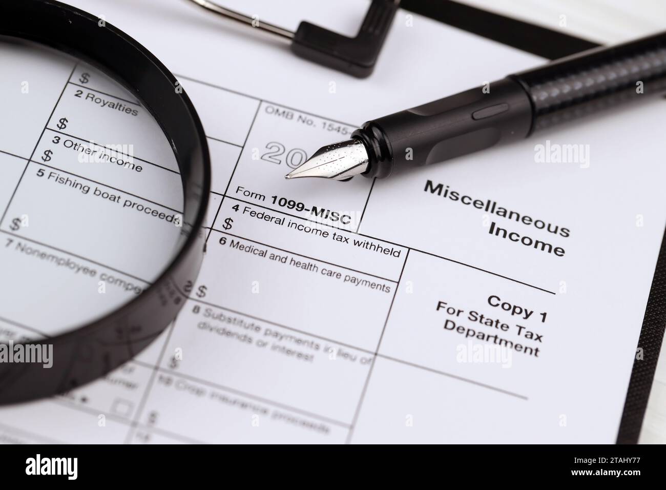 IRS Form 1099-misc Miscellaneous income blank on A4 tablet lies on ...