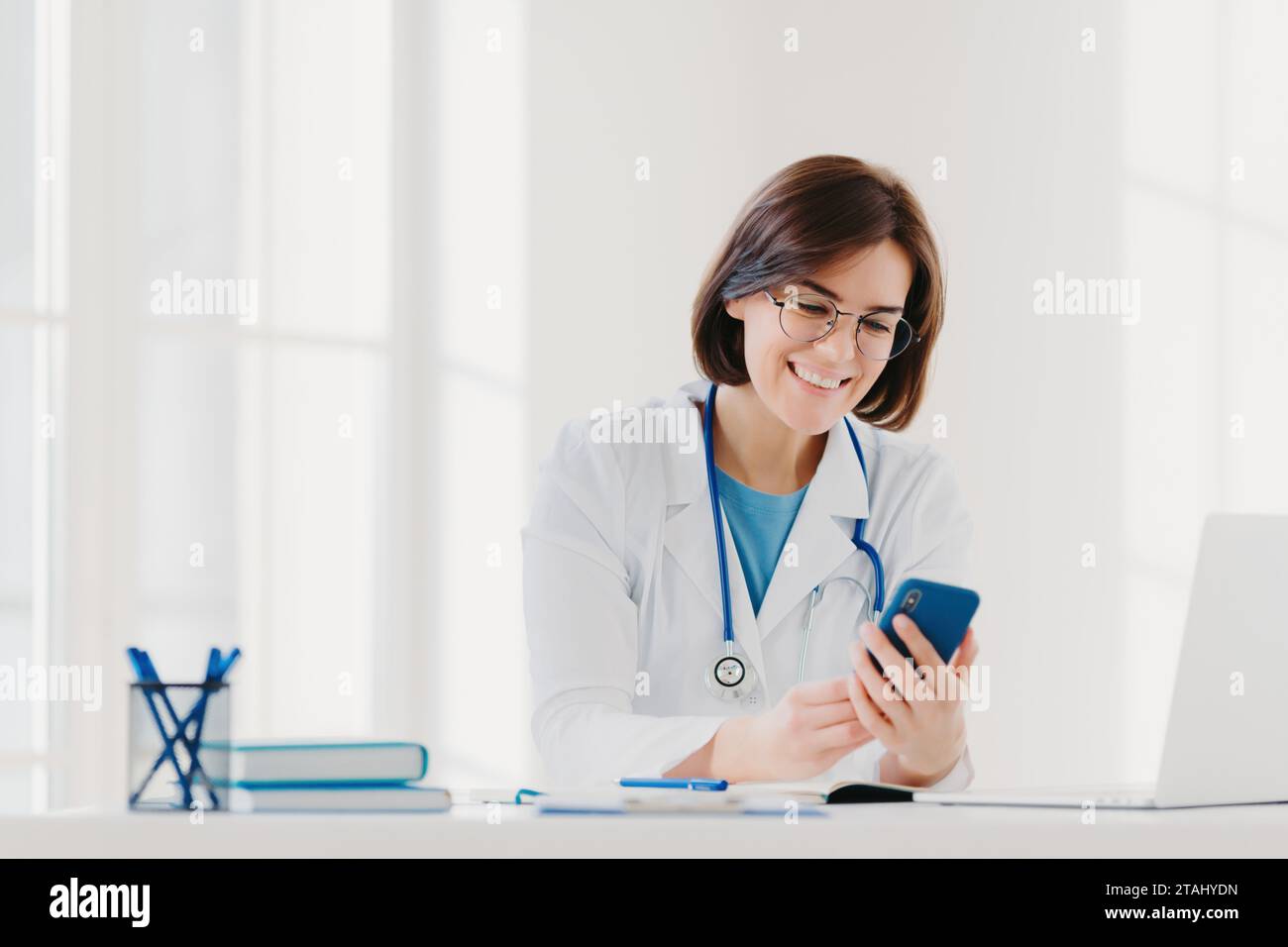 Female doctor in desktop stethoscope hi-res stock photography and ...