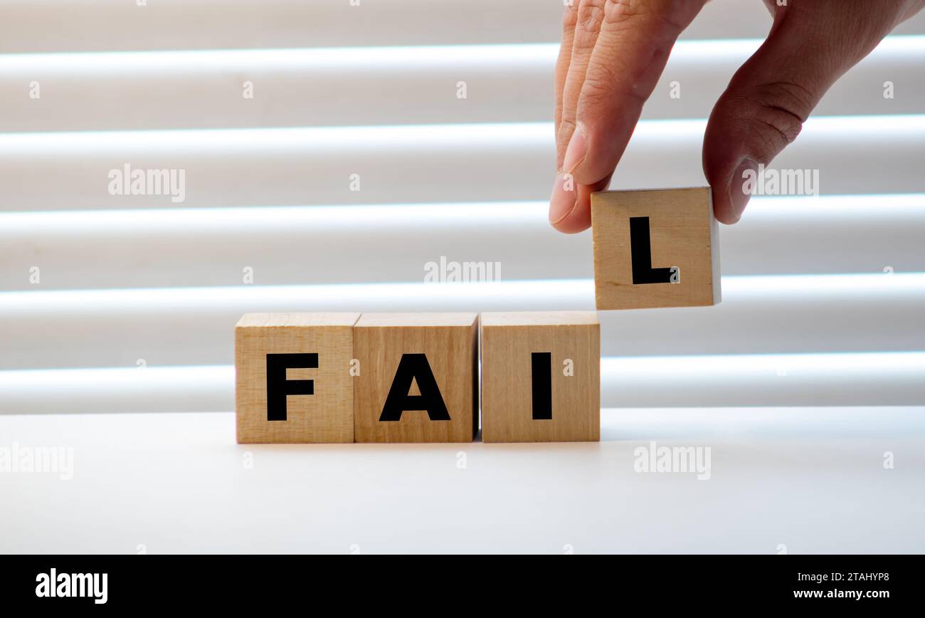 Alphabet letter block in word fail on wood background Stock Photo - Alamy