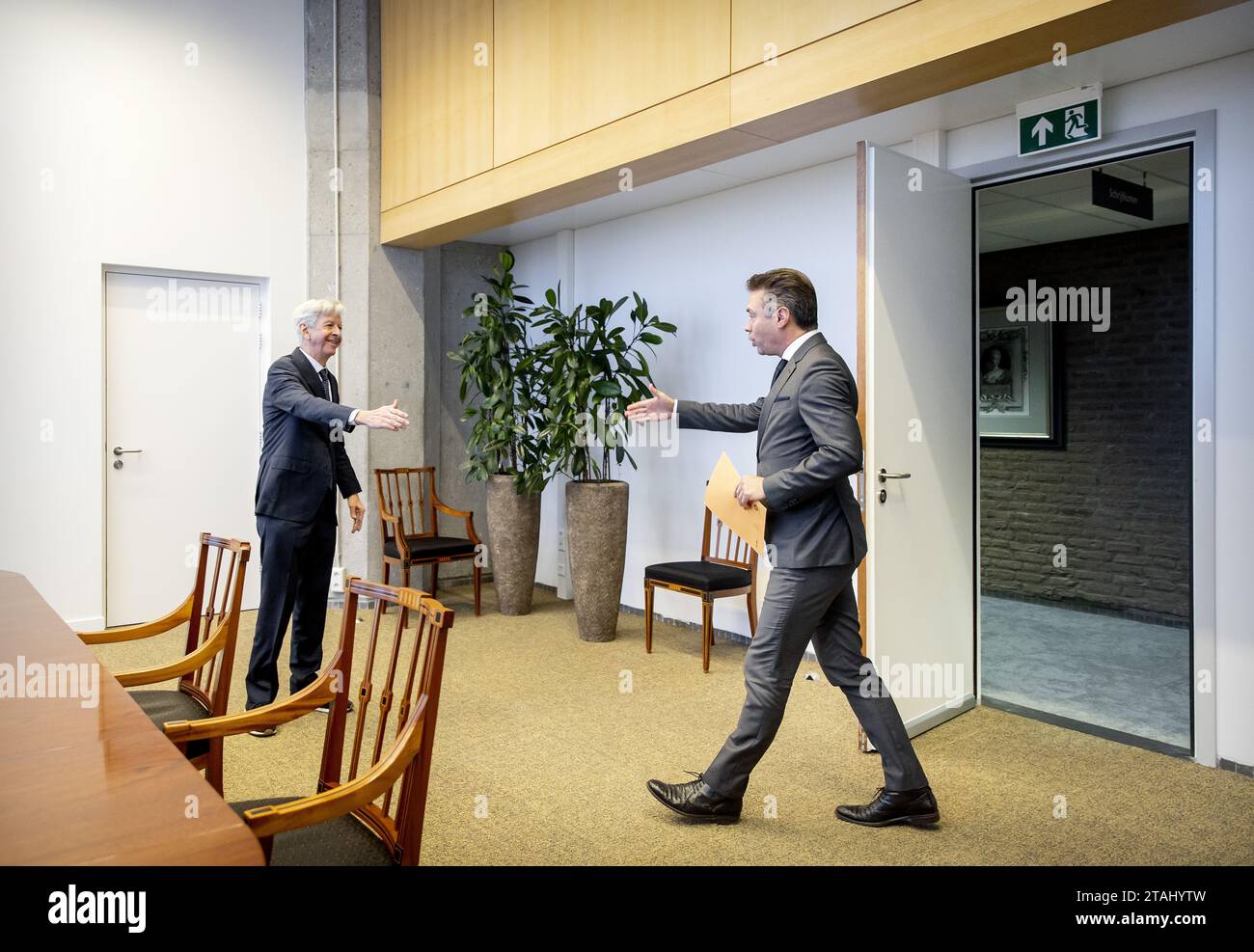 THE HAGUE - Chris Stoffer (SGP) during a conversation with scout Ronald ...