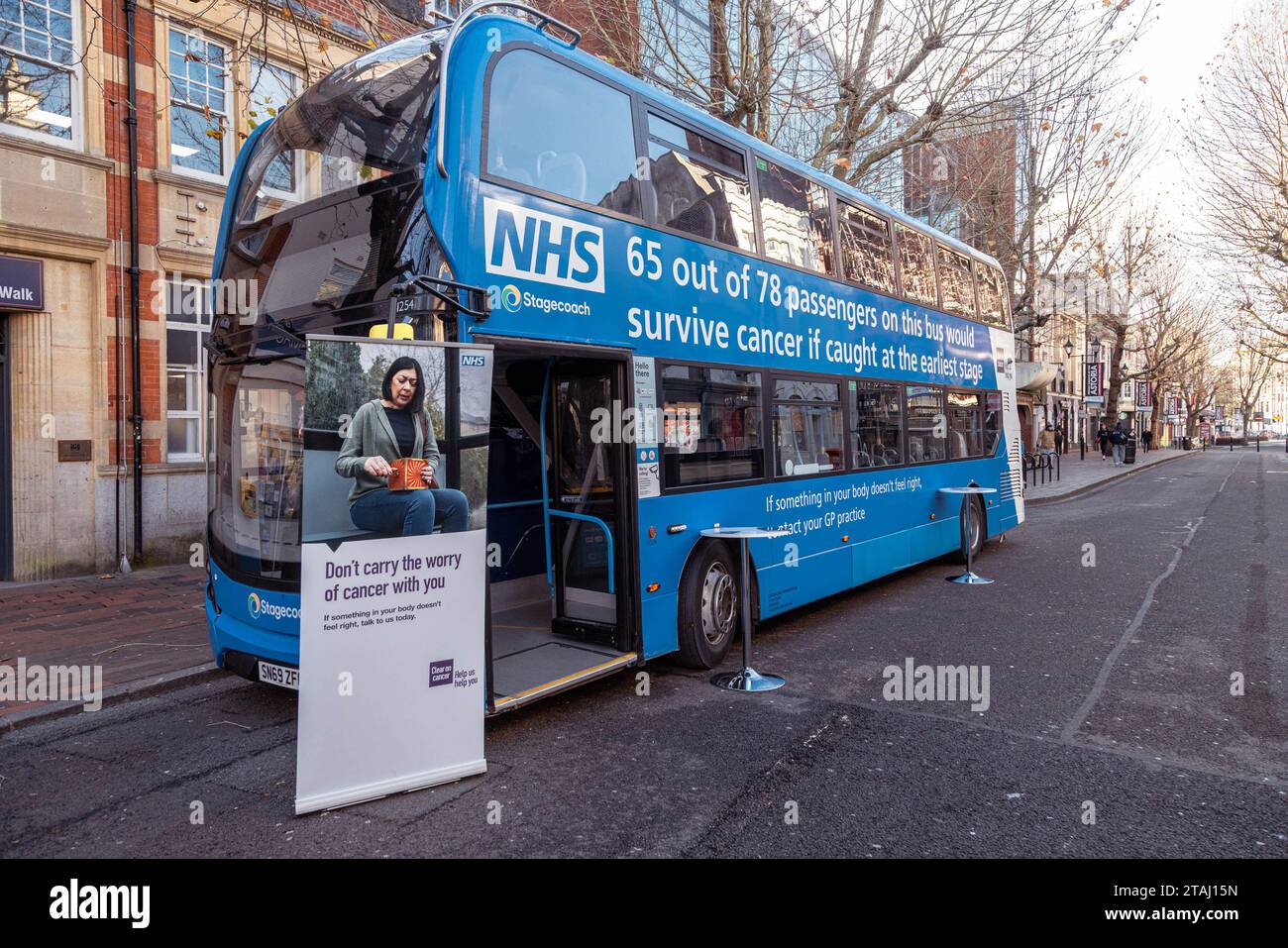 EDITORIAL USE ONLY The 'NHS Bus-ting Cancer' bus passes through ...