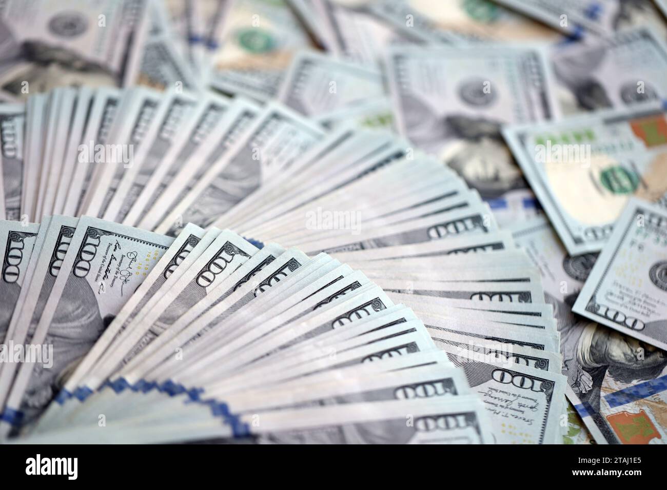 Very big amount of US hundred dollar bills close up. Huge quantity of ...