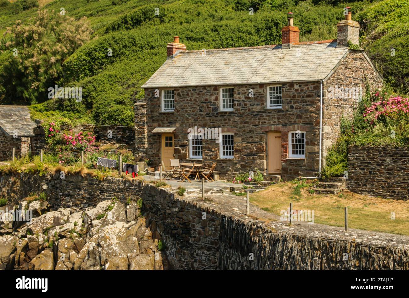 Cottage in Port Quin, a cove on the coast of Cornwall, England Stock ...