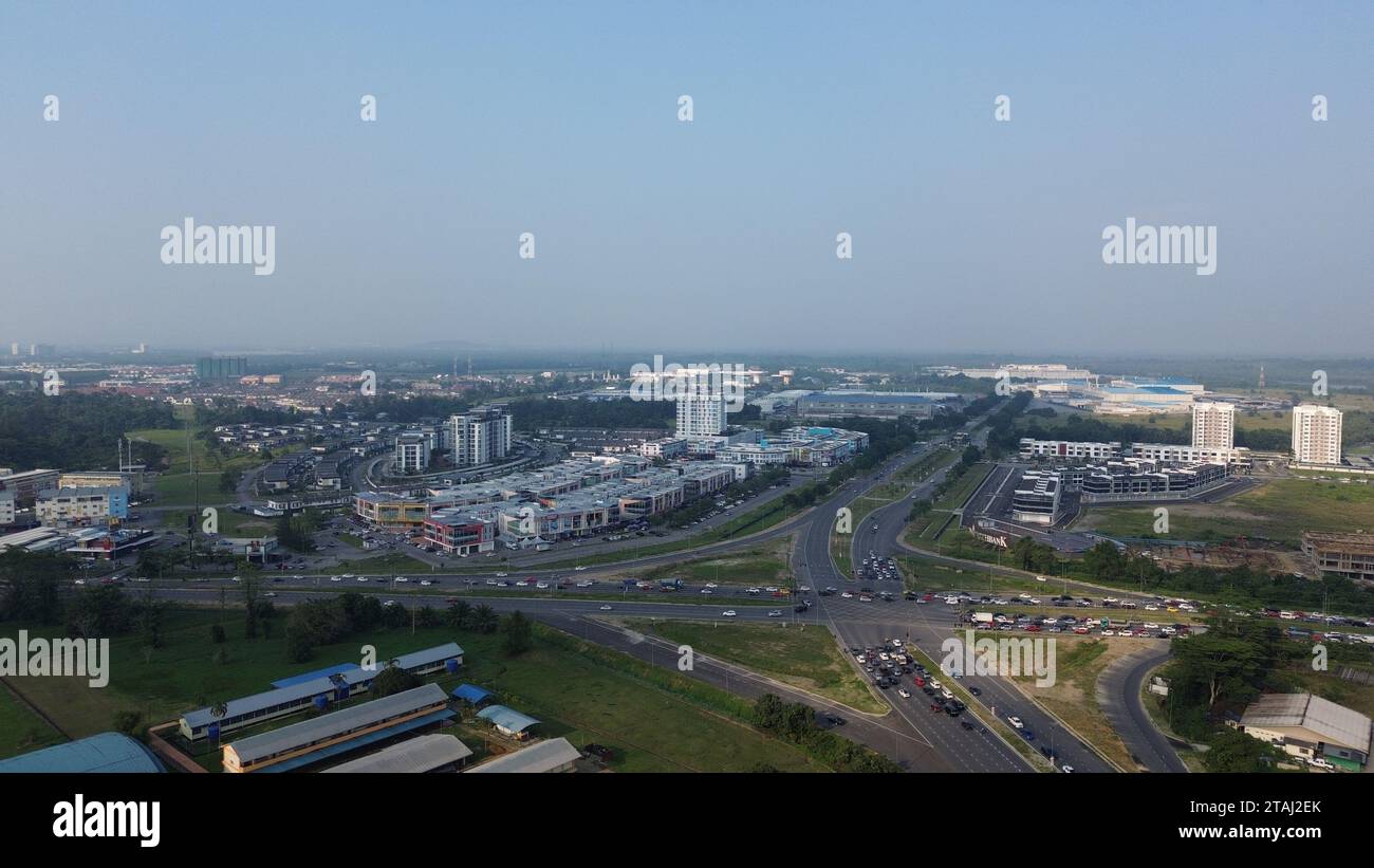 Aerial view of a bustling cityscape with high-rise buildings, busy ...