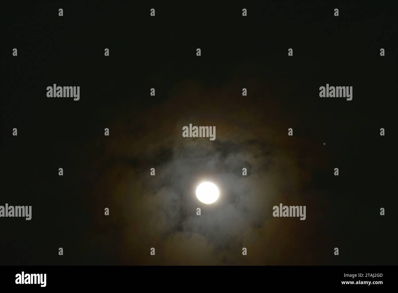 bright yellow full moon floating on sky in night Stock Photo - Alamy