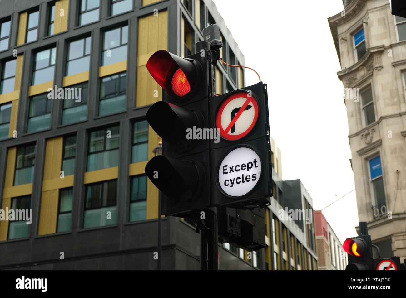 Red light with Except Cycle sign Stock Photo - Alamy