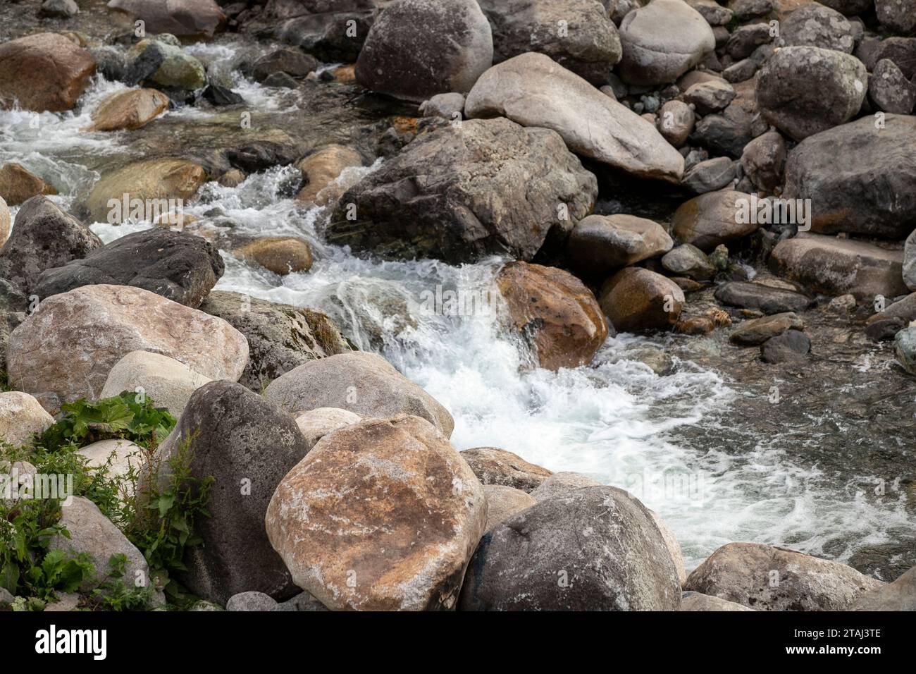 Mountain stream flows among stones hi-res stock photography and images ...