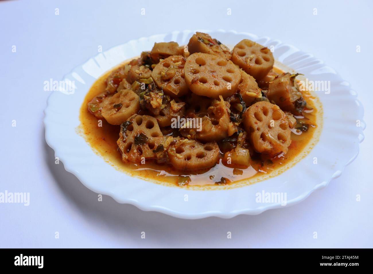Tasty Lotus stem curry, a side dish made with lotus stem. Kamal kakdi ...