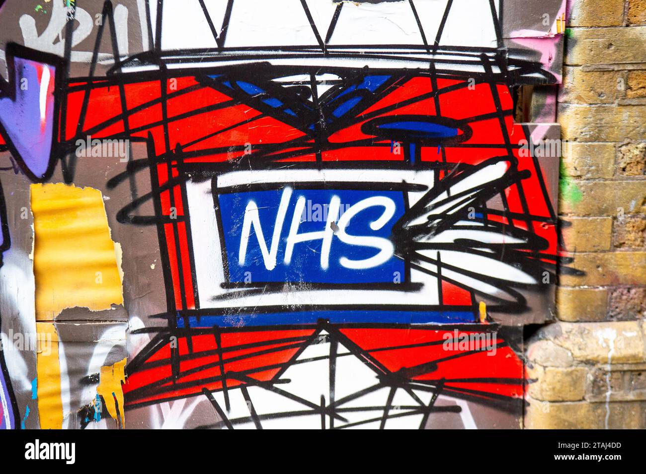 London, UK. 27th November, 2023. NHS graffiti near Waterloo station ...
