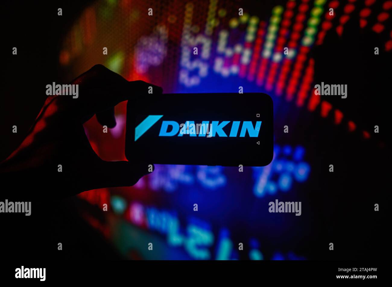 In this photo illustration, a Daikin logo is displayed on a smartphone ...