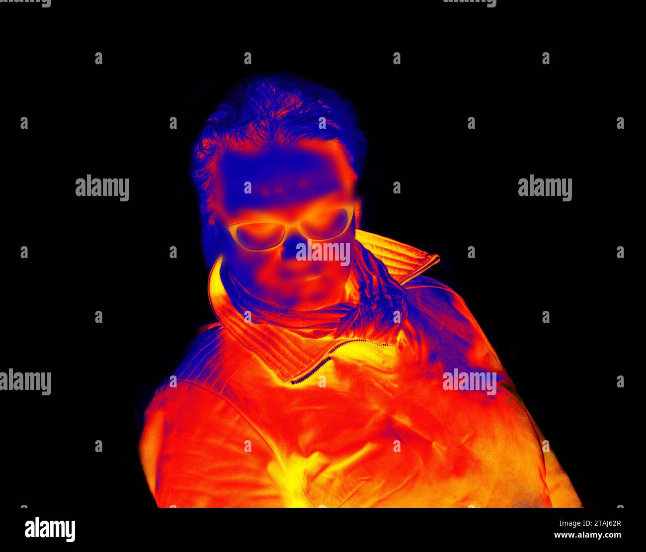 Portrait of a middle-aged man in everyday life. Thermal imaging on a ...