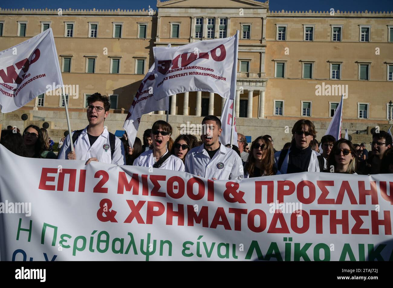 Striking hospital doctors shout slogans during a protest demanding ...