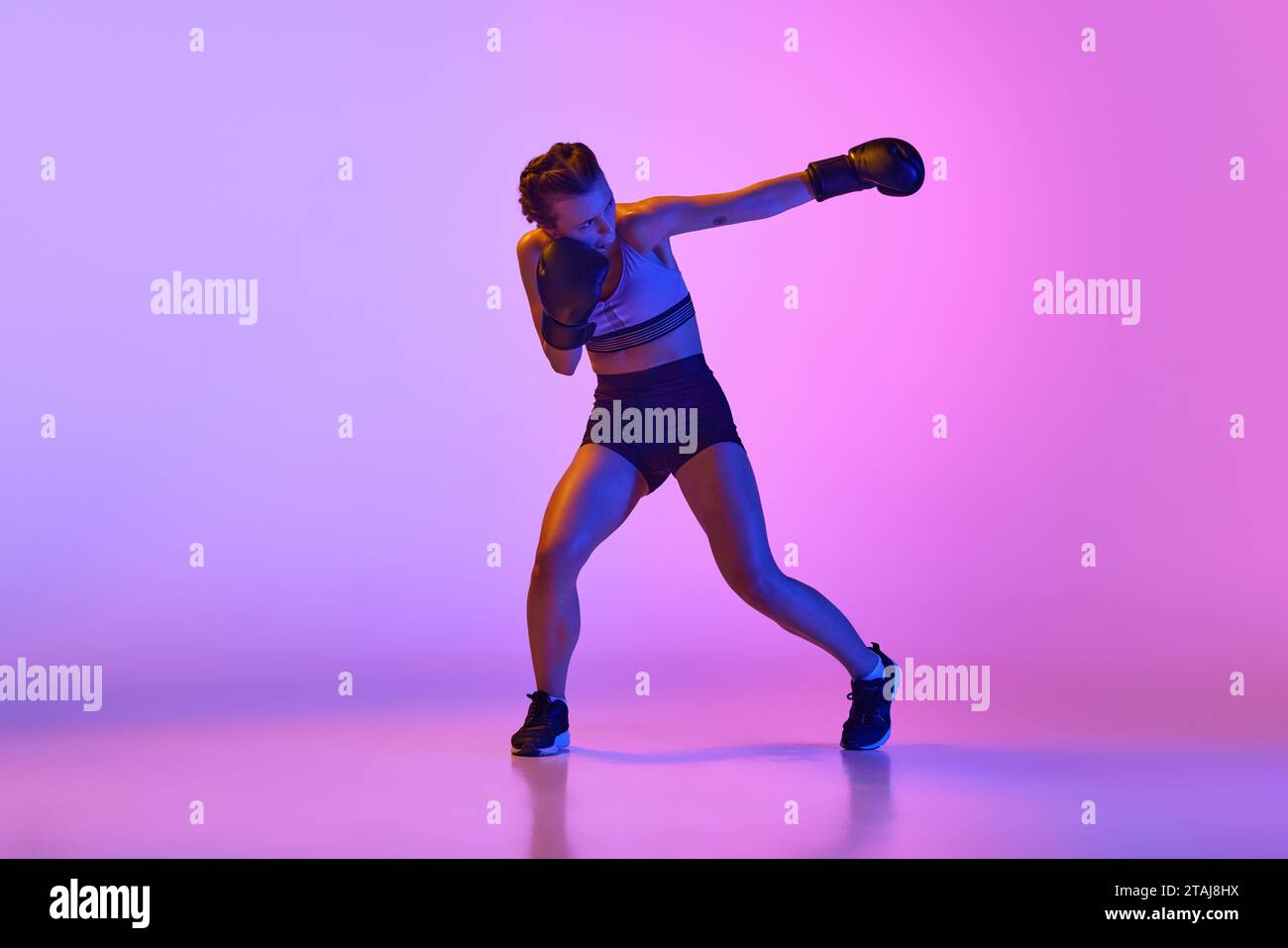 Dynamic and intense, female professional boxer showcases her ...