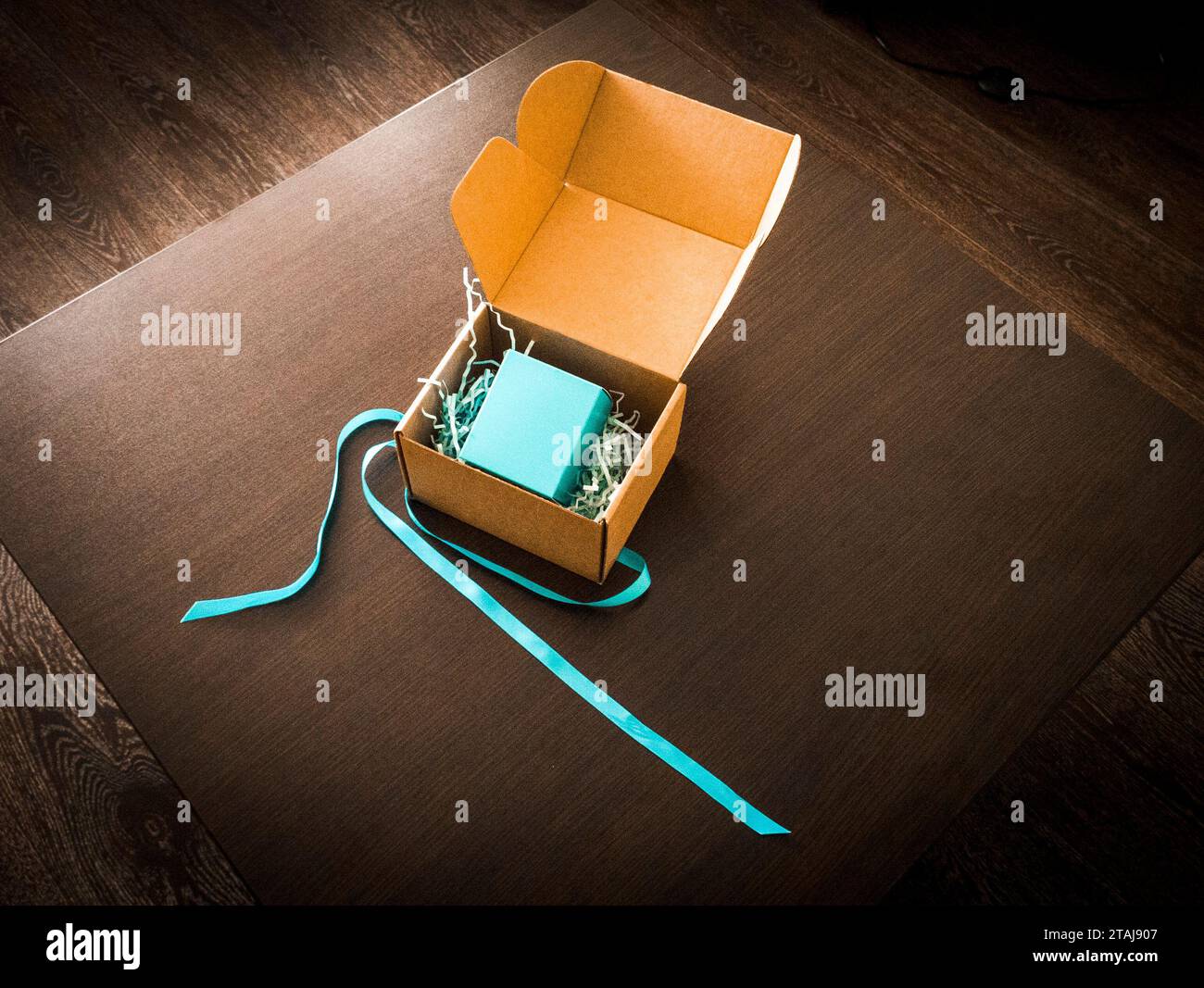 Unwrapped gift box hi-res stock photography and images - Alamy