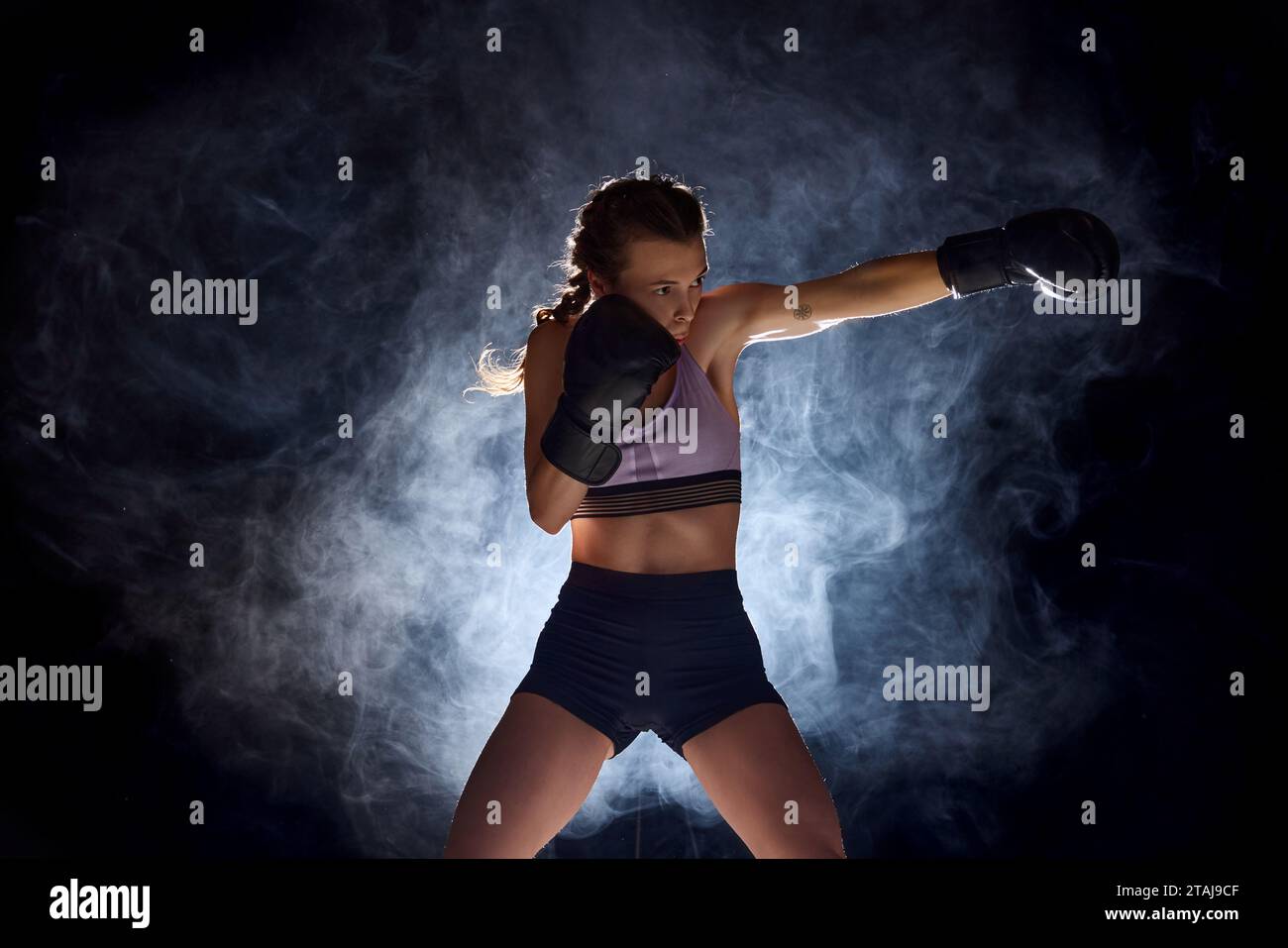 Dynamic and intense, female professional boxer showcases her ...