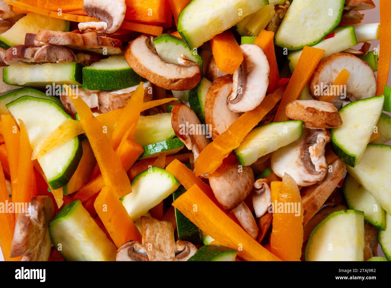 Raw stir fry mixed vegetables Stock Photo - Alamy